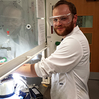 SCI: Samuel Miller, SCI Scholar, presents his end of year report